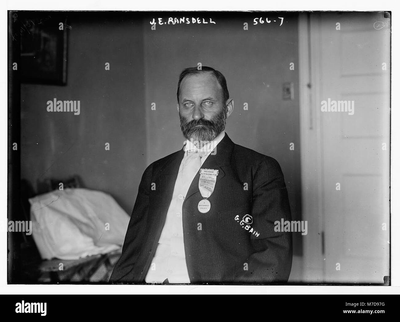 A portrait of J.E. Ransdell, an influential figure captured in a formal ...