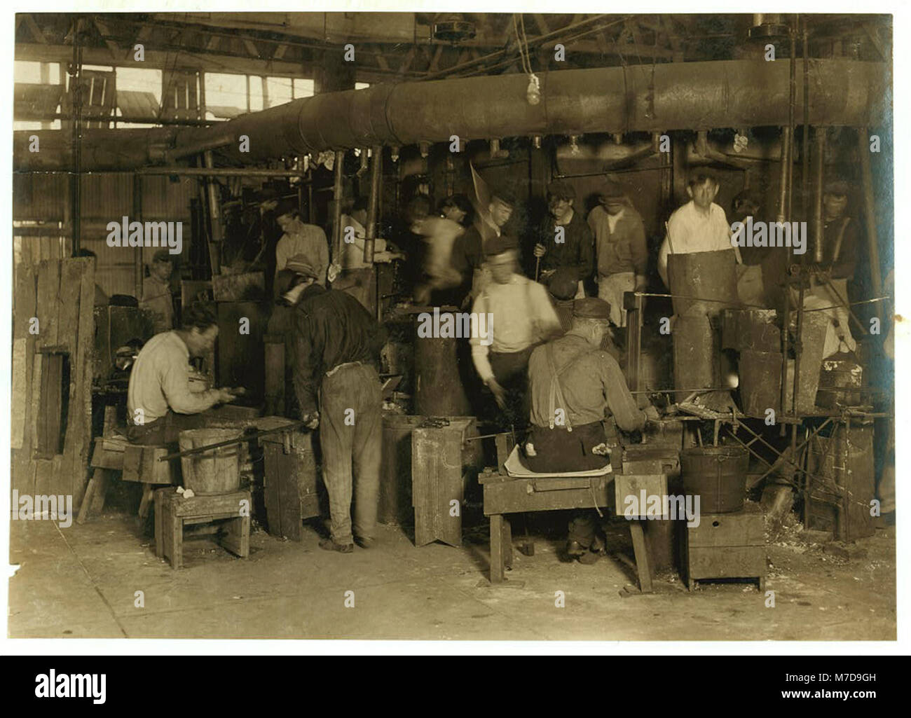 A historical image of the J. C. Wheaton Glass Works, capturing the ...