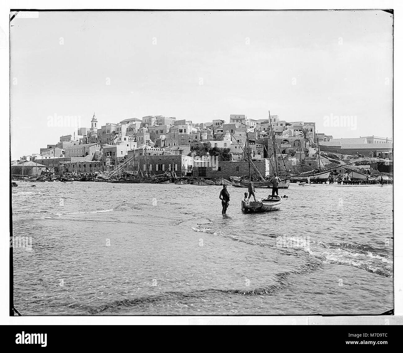 The photograph depicts the ancient port city of Jaffa (also known as ...