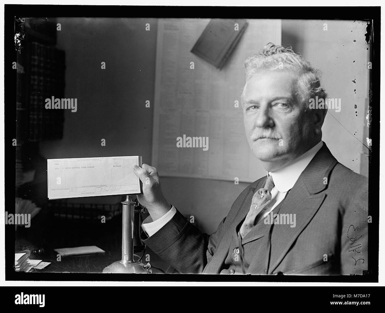 James H. Preston, Mayor of Baltimore, is depicted holding a document ...