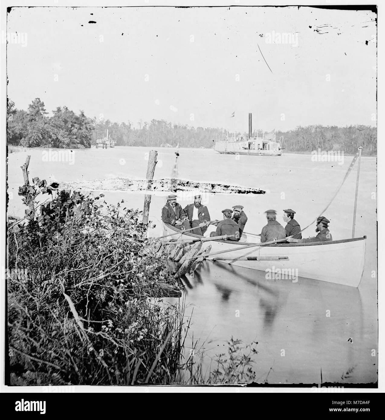An image of the officers and men aboard the Commodore Perry, a U.S ...