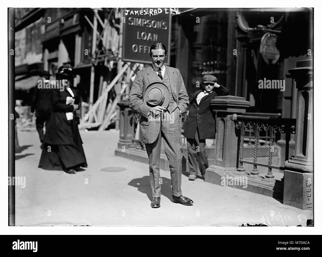 A photograph of James Radley walking on a street in New York, capturing ...