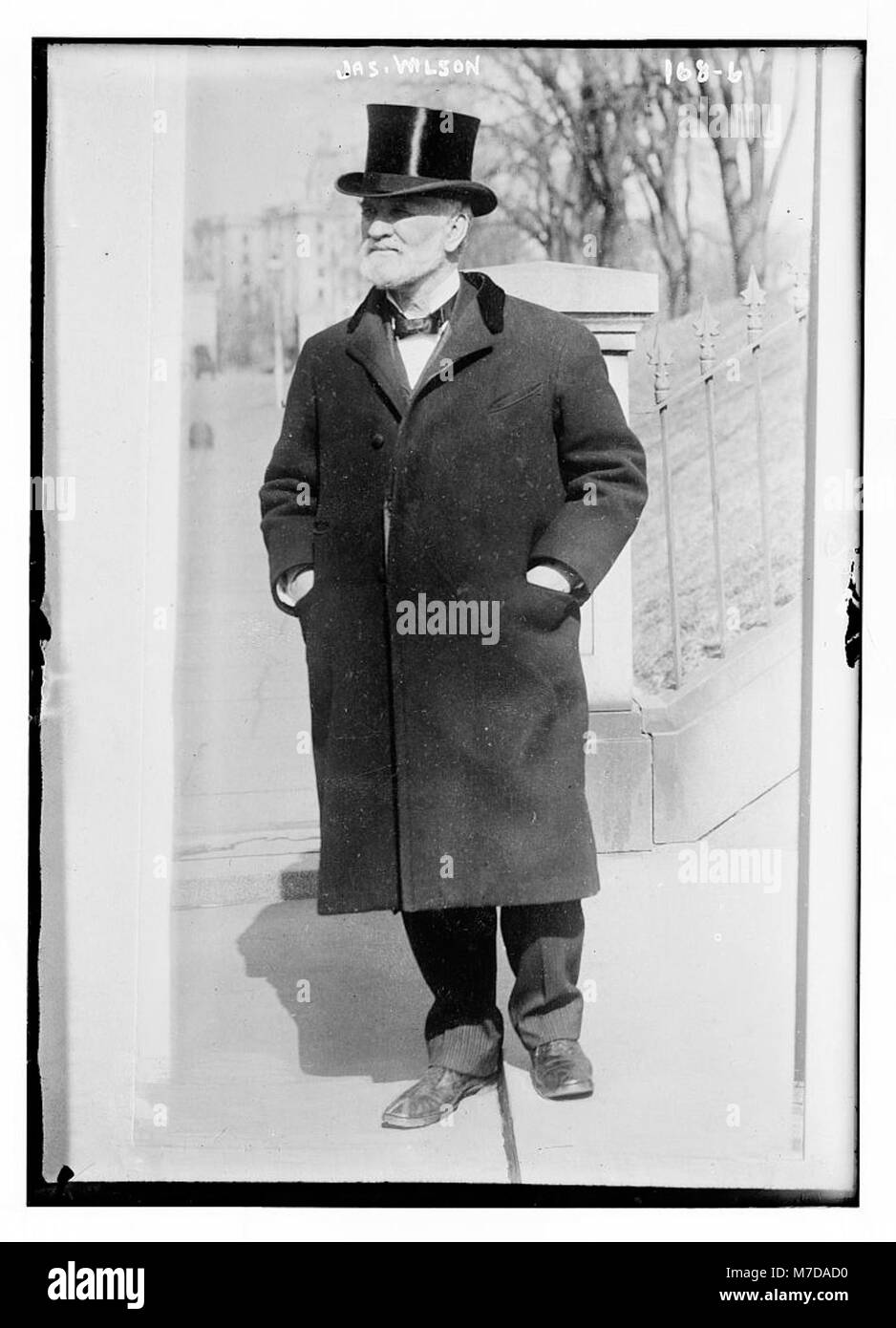 A formal portrait of Jas. Wilson, likely a historical figure, captured ...