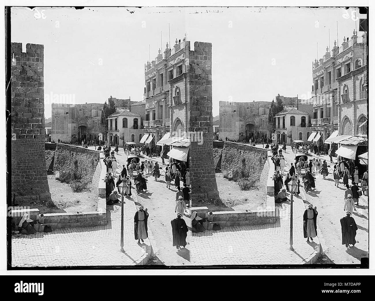 This image depicts a street scene inside the Jaffa Gate in Jerusalem ...