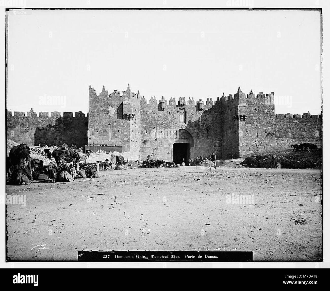 This photograph features the Damascus Gate in Jerusalem, a historic and ...