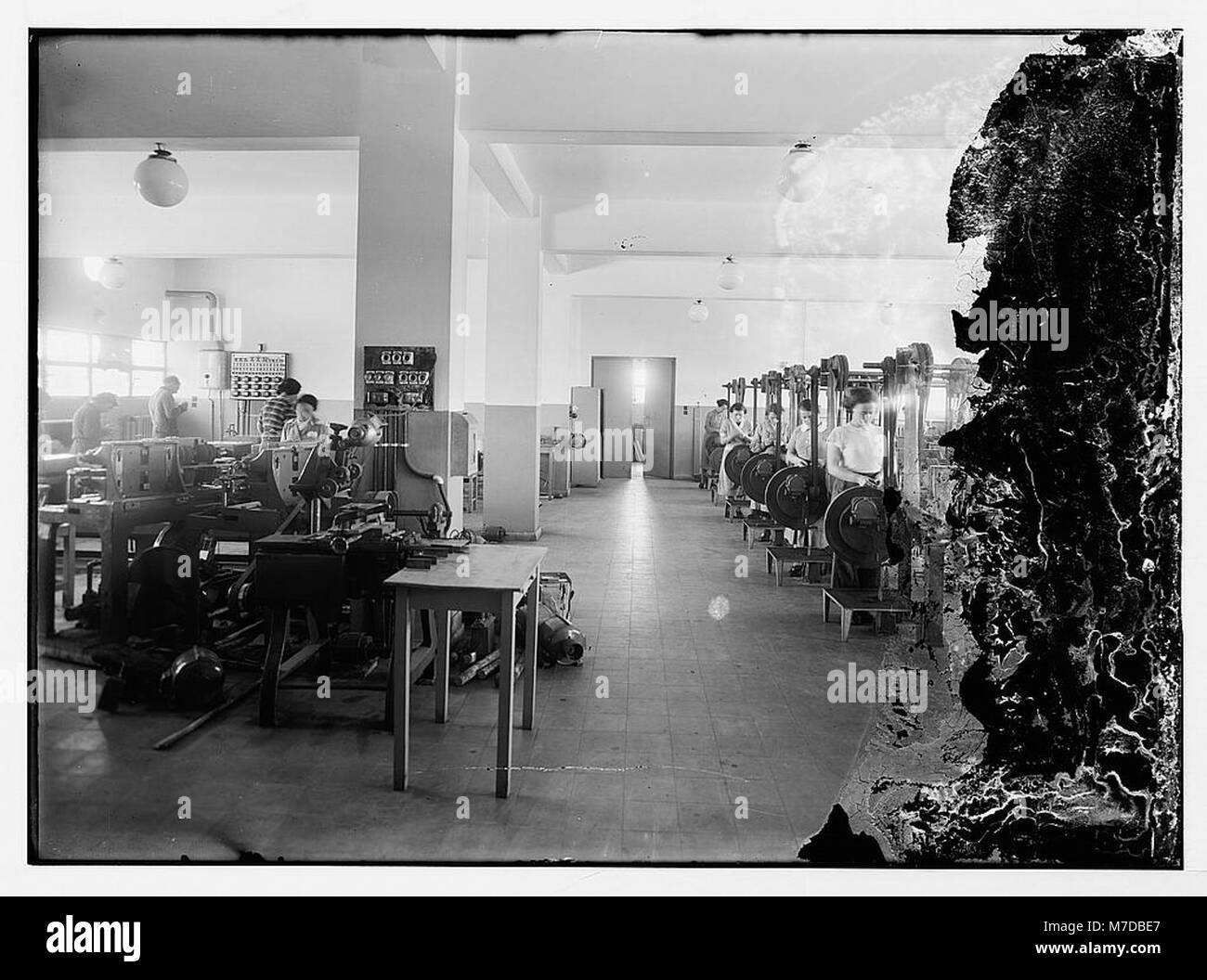 A historical photograph depicting Jewish factories, capturing the ...