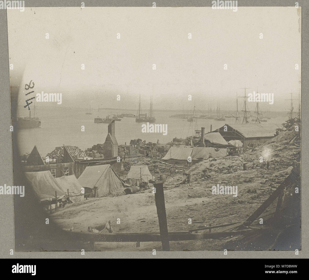 The image shows the docks at City Point, Virginia, after the explosion ...