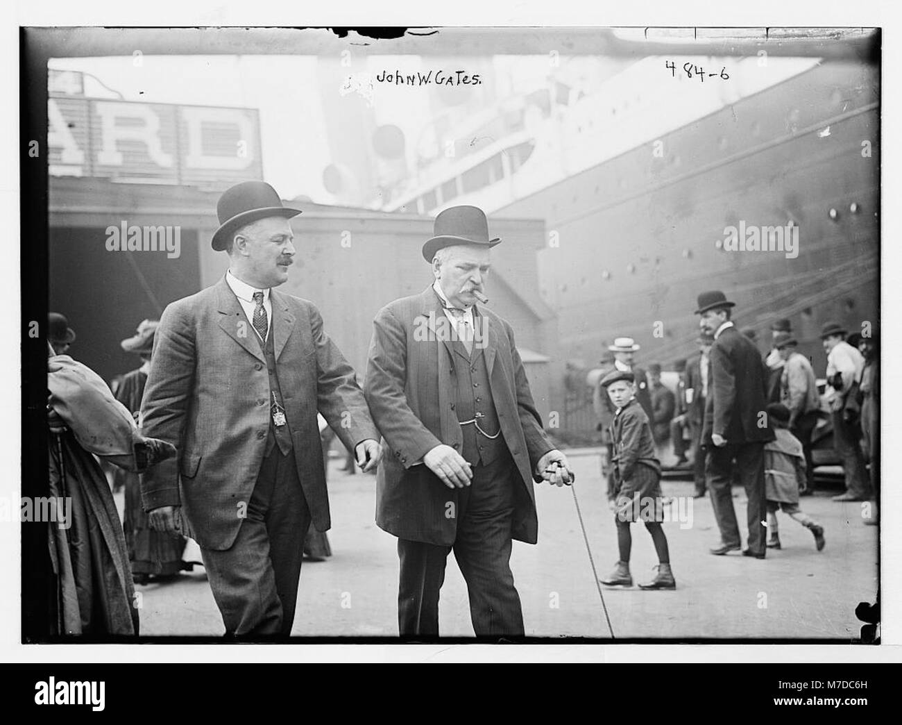 A formal portrait of John W. Gates, showcasing a key figure in American ...
