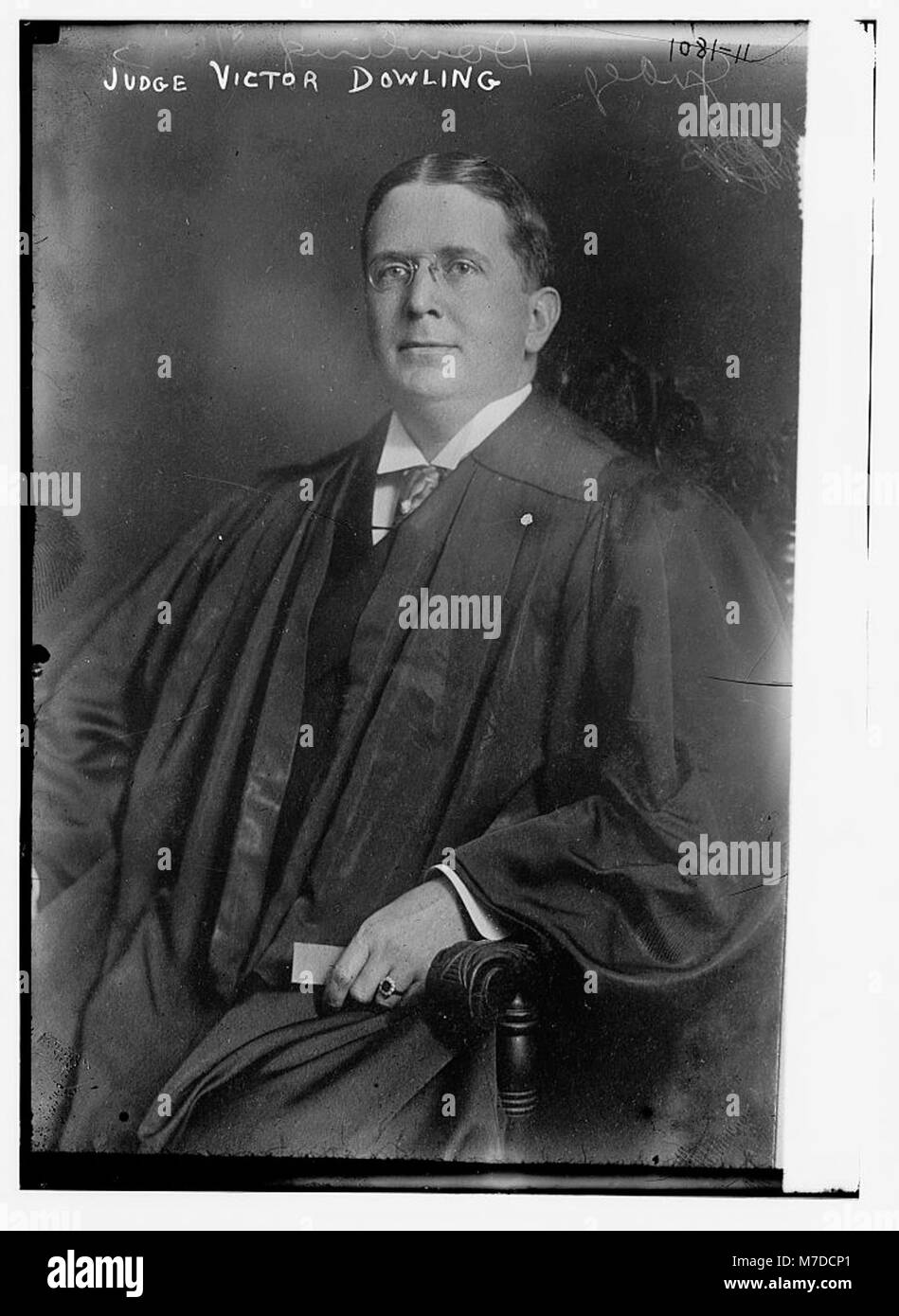 Portrait of Judge Victor Dowling seated in his judicial robes ...