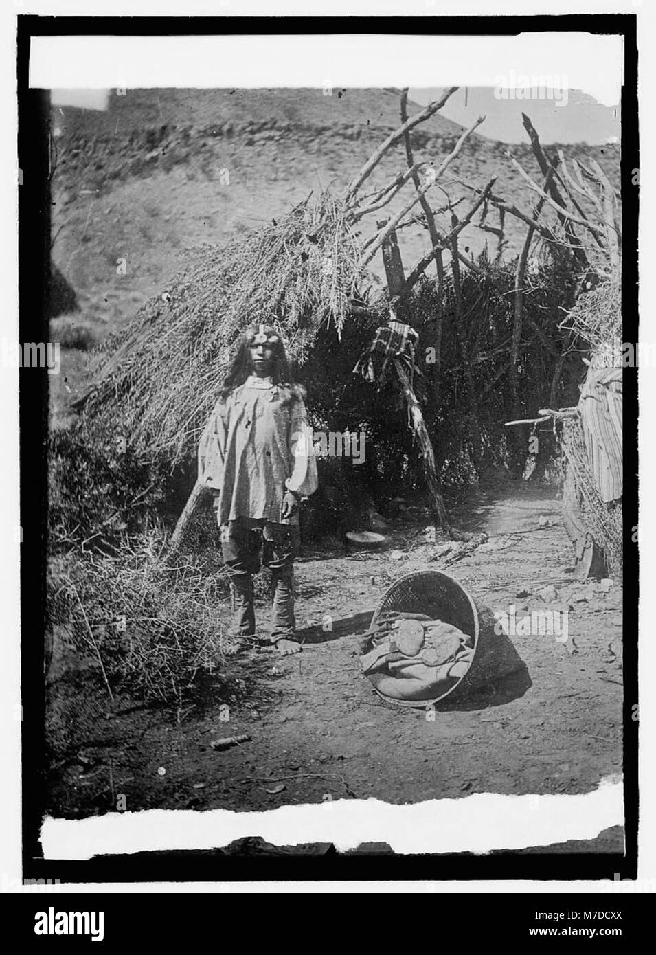 A photograph showing Kahn in the tent of the Pinte Indians, a Native ...