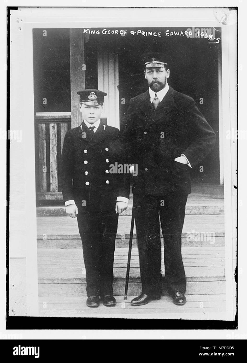 A historical photograph of King George and Prince Edward standing side ...