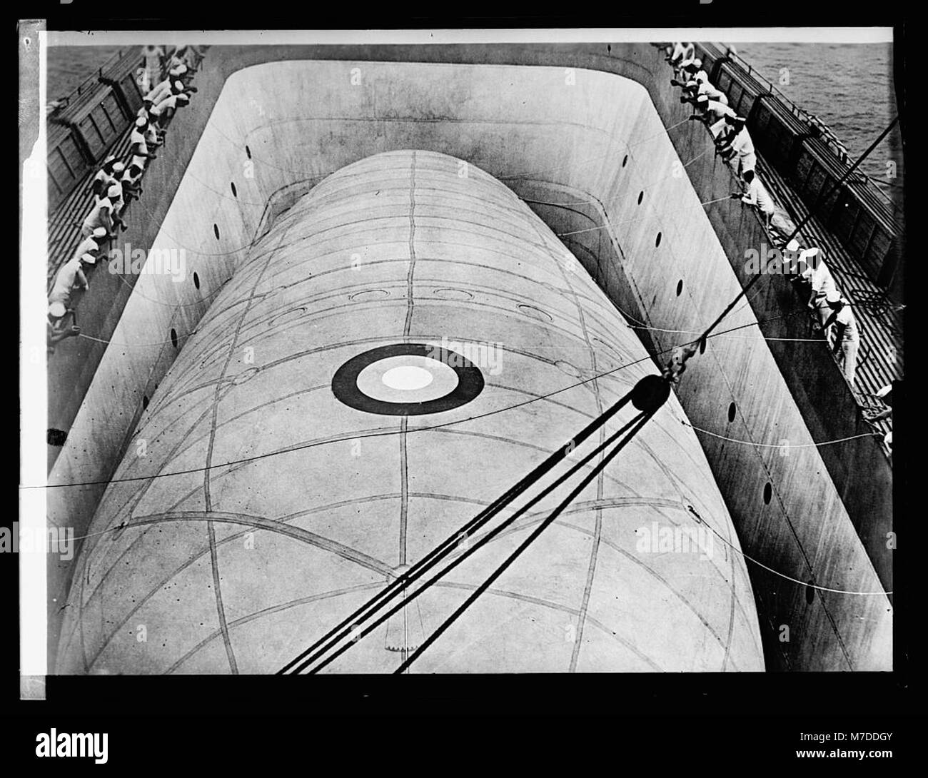 A photograph of a kite balloon in the well of the U.S.S. Wright ...