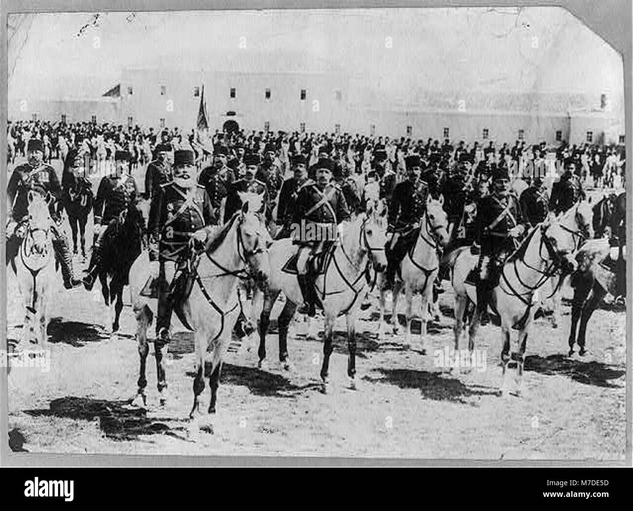 A historical photograph showing a large group of Turkish Cavalry ...