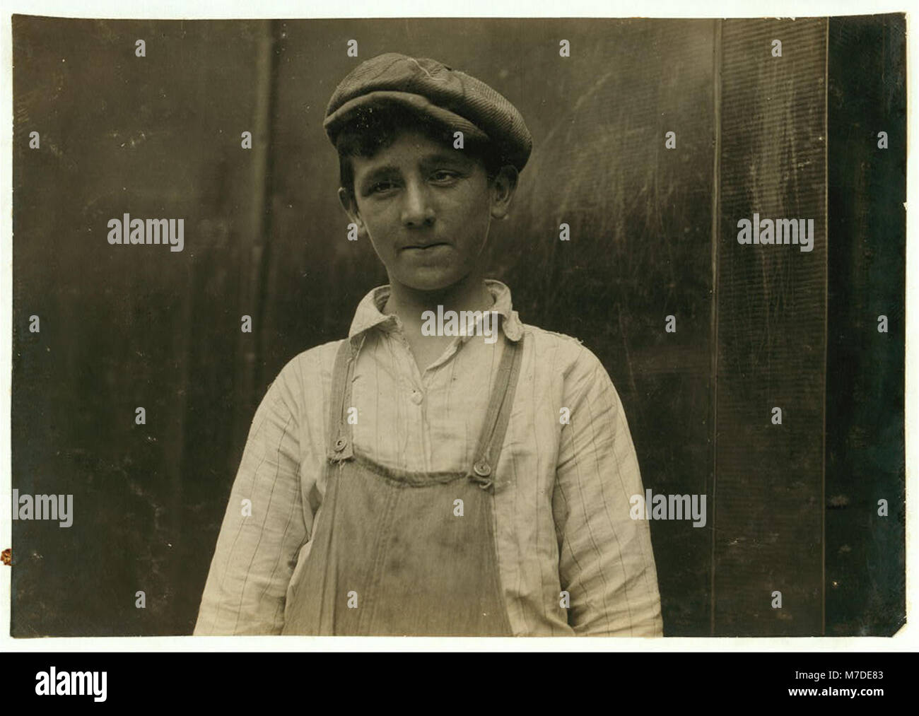 A portrait of Lawrence Burns, a 14-year-old doffer at Pocasset Mills ...