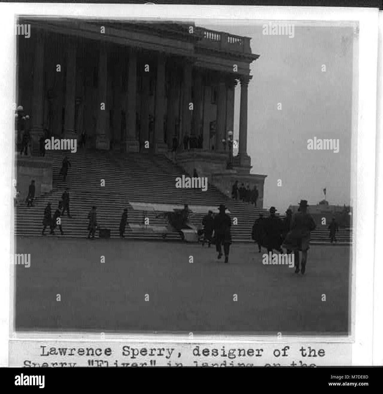 Lawrence Sperry, inventor of the Sperry 'Fliver,' is shown in a plane ...