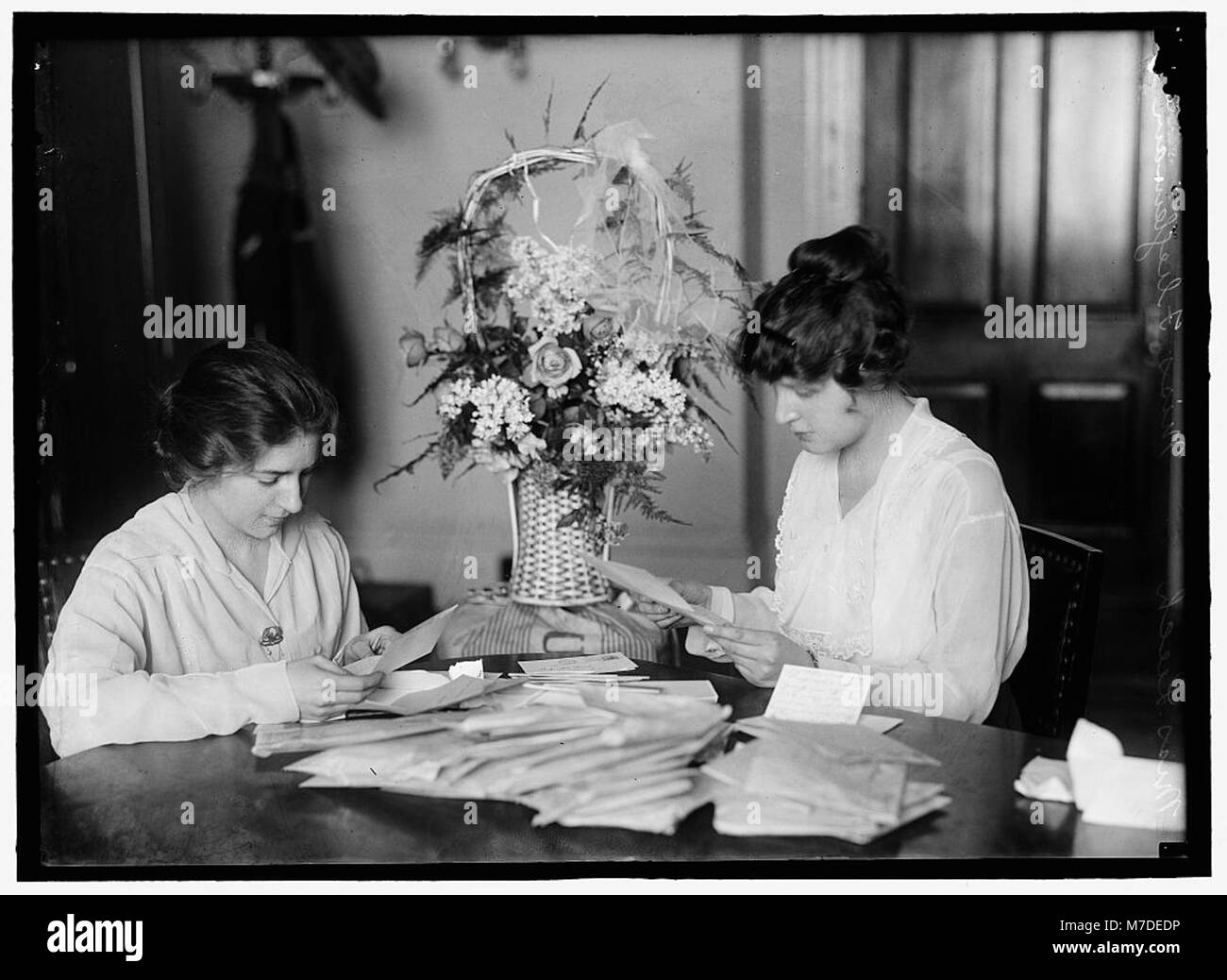 A historical photograph of Miss Leech and Miss Fleigleman, possibly ...