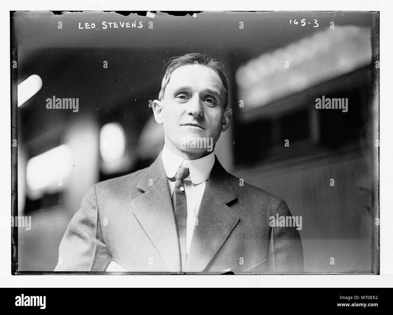 A portrait of Leo Stevens, captured in a photograph. The image provides ...