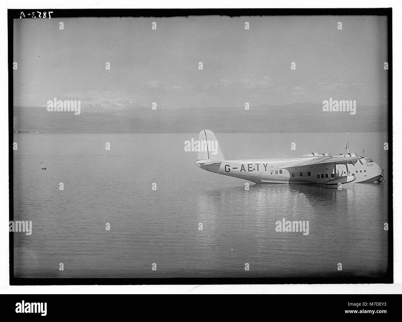 Lido, flying boat Clio. Flying boat 'Clio' on the lake with snow-capped ...
