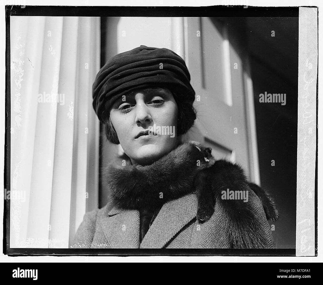 A formal portrait of Lindsay Wood, capturing the subject in a dignified ...