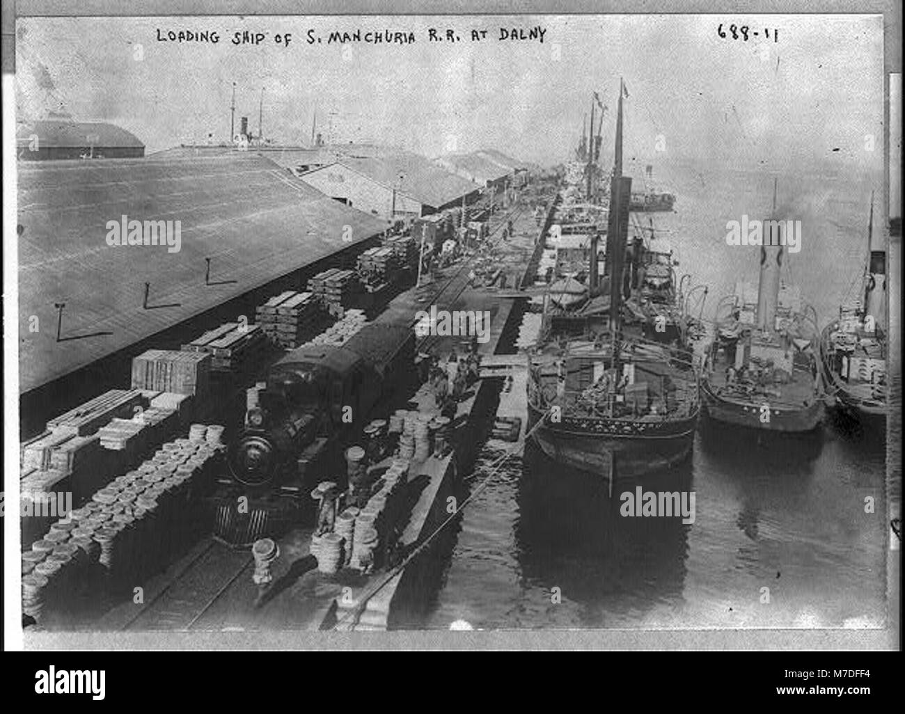 A historical photograph depicting the loading of ships by the South ...