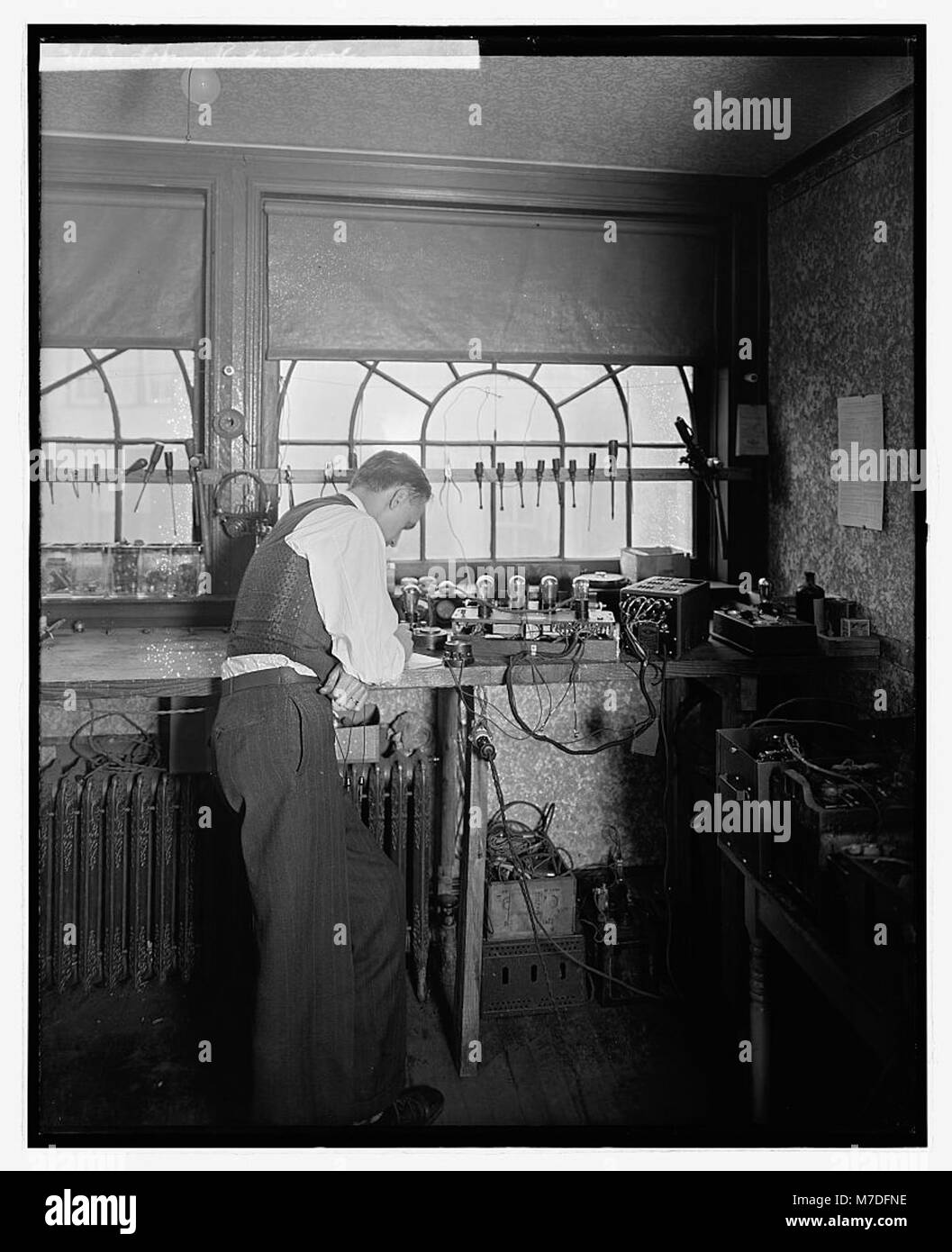 This historical image depicts the Loomis Radio School, an institution ...