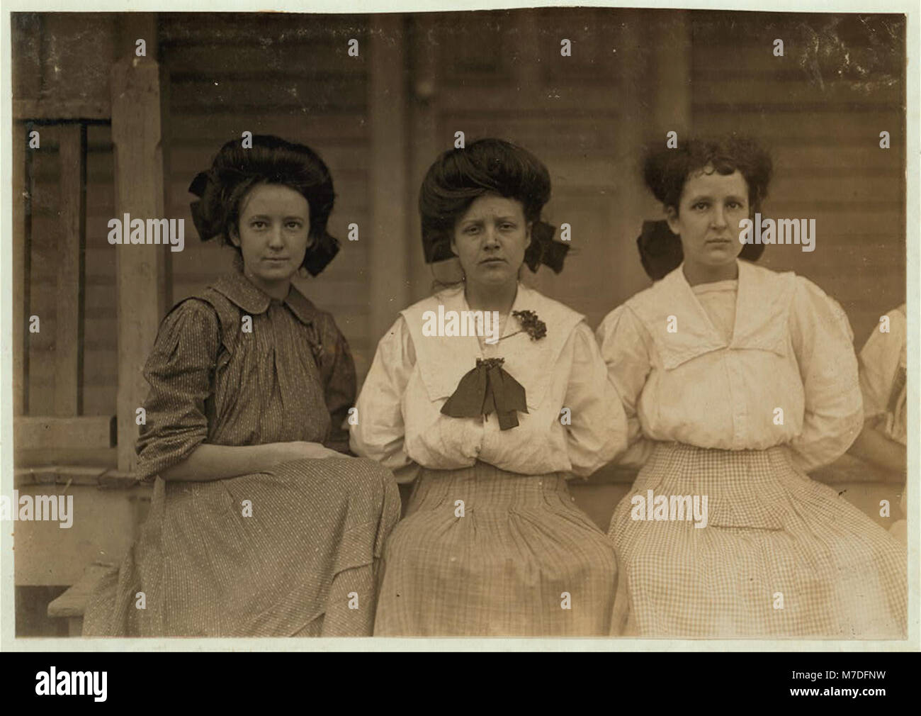 This image shows three girls working at the Loray Mill in Gastonia ...