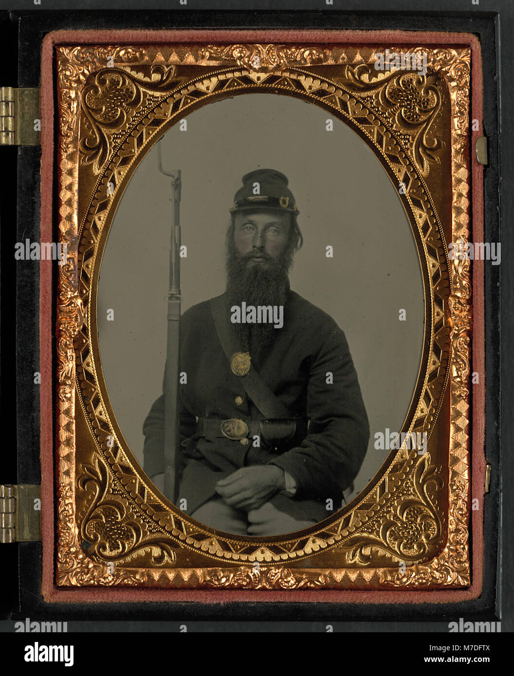 An unidentified Union soldier stands with a bayoneted rifle musket ...