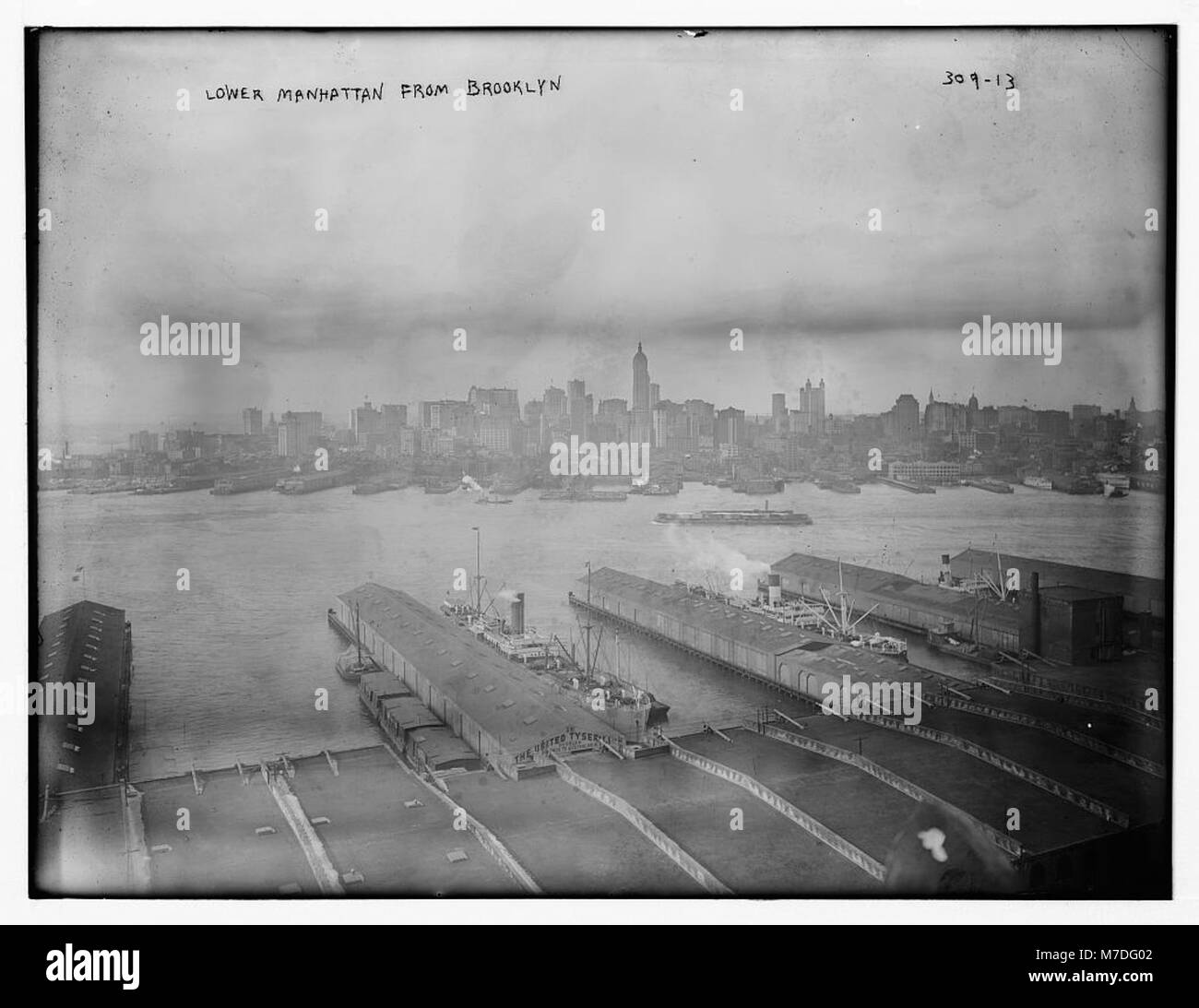 A scenic view of Lower Manhattan, taken from Brooklyn, showcasing the ...