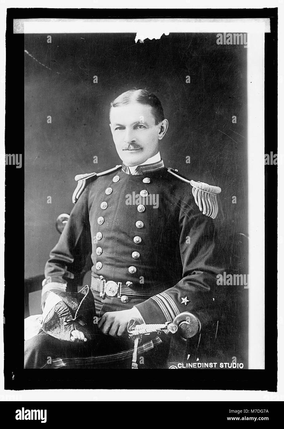 A portrait of Lieutenant Commander S.S. Wood, capturing his role in the ...