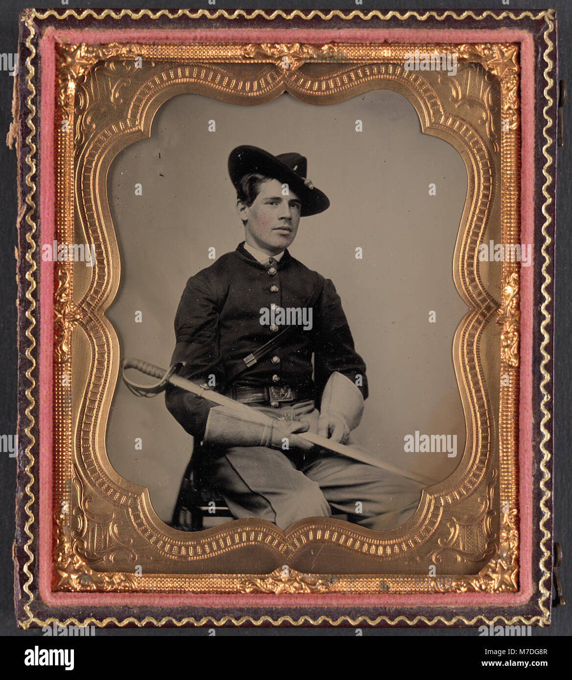 An unidentified cavalry soldier in Union uniform, posed with a sword ...