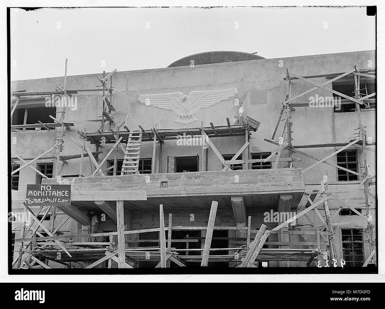 A photograph of Lydda Airport, featuring a sculpted flying eagle on its ...