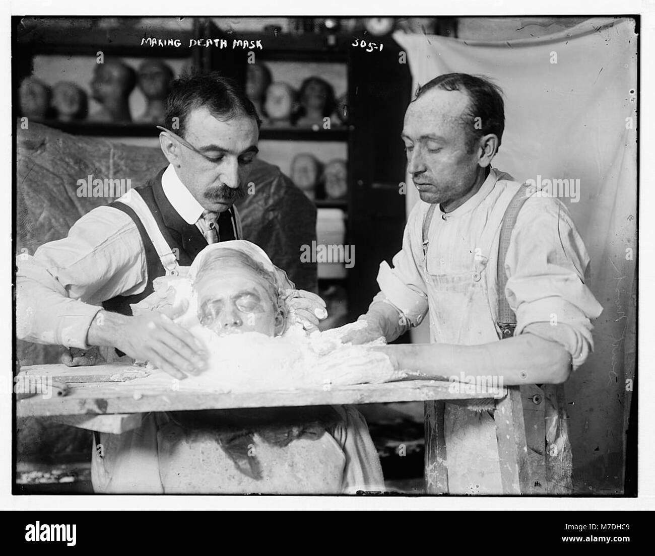 The process of creating a death mask, capturing the facial features of ...