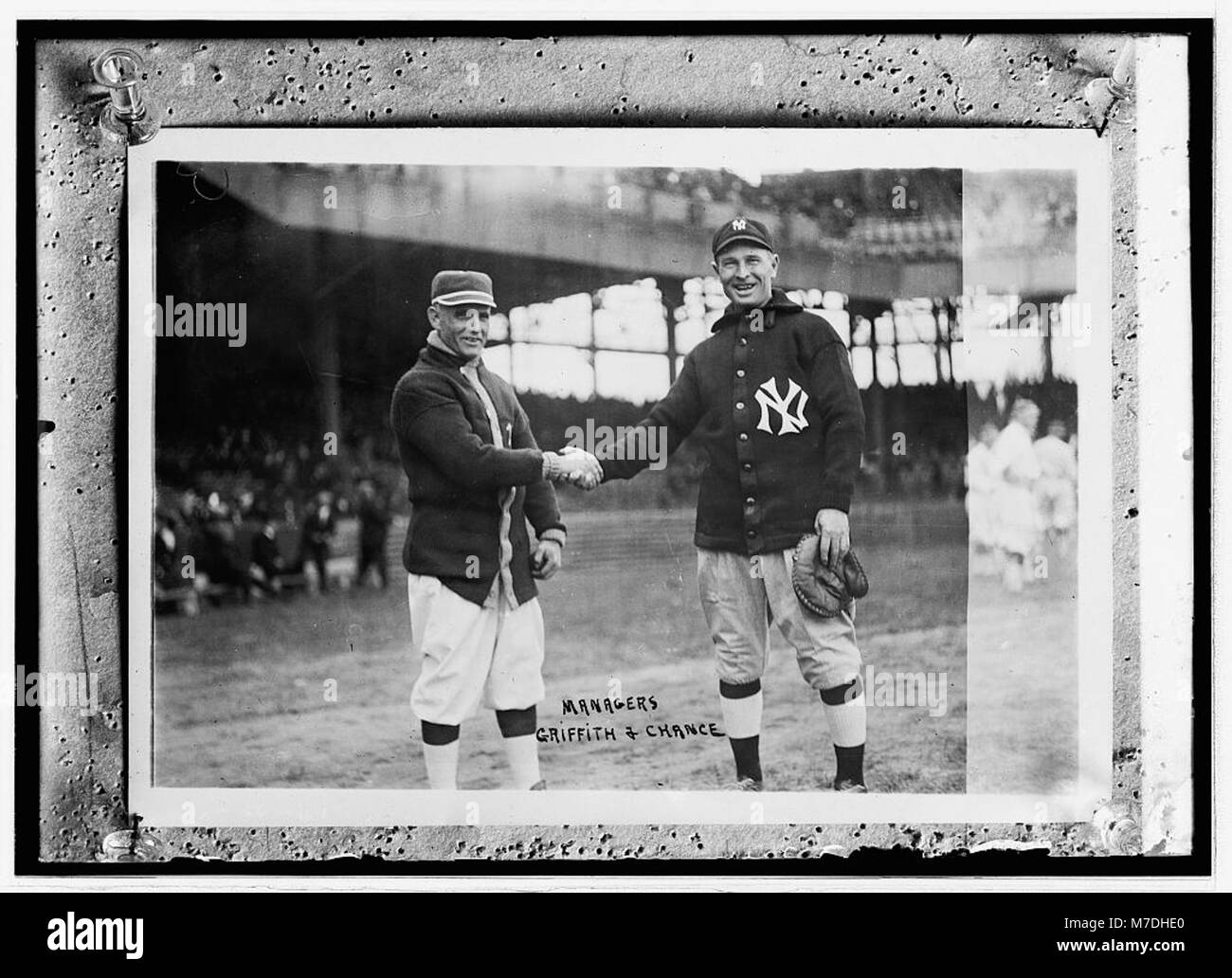 This image shows managers Griffith and Chance, captured in a business ...