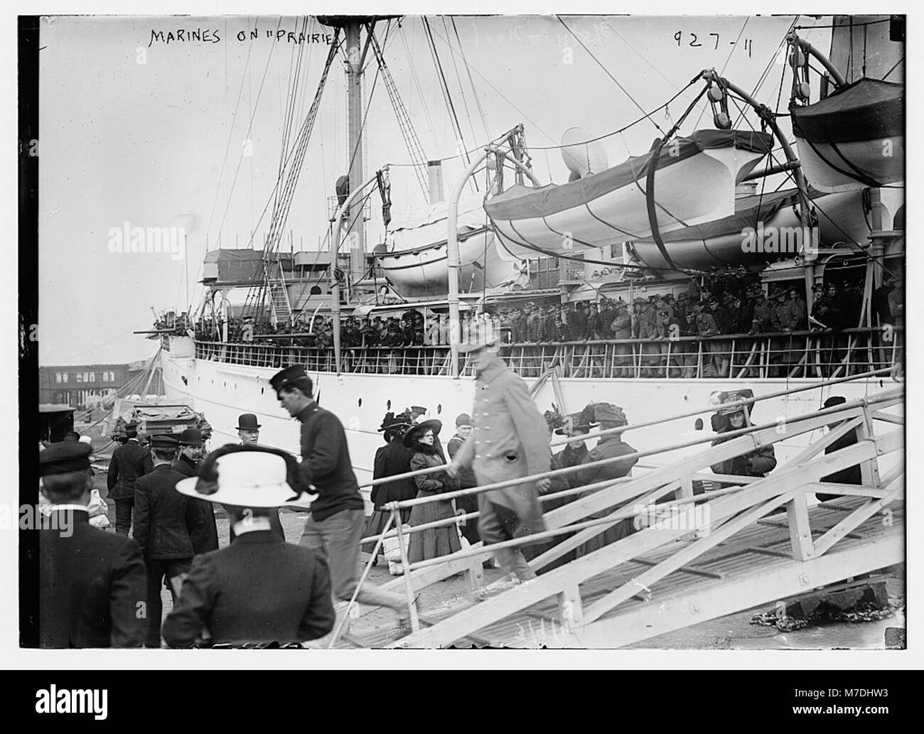 This image shows U.S. Marines aboard the USS Prairie, a naval ship ...