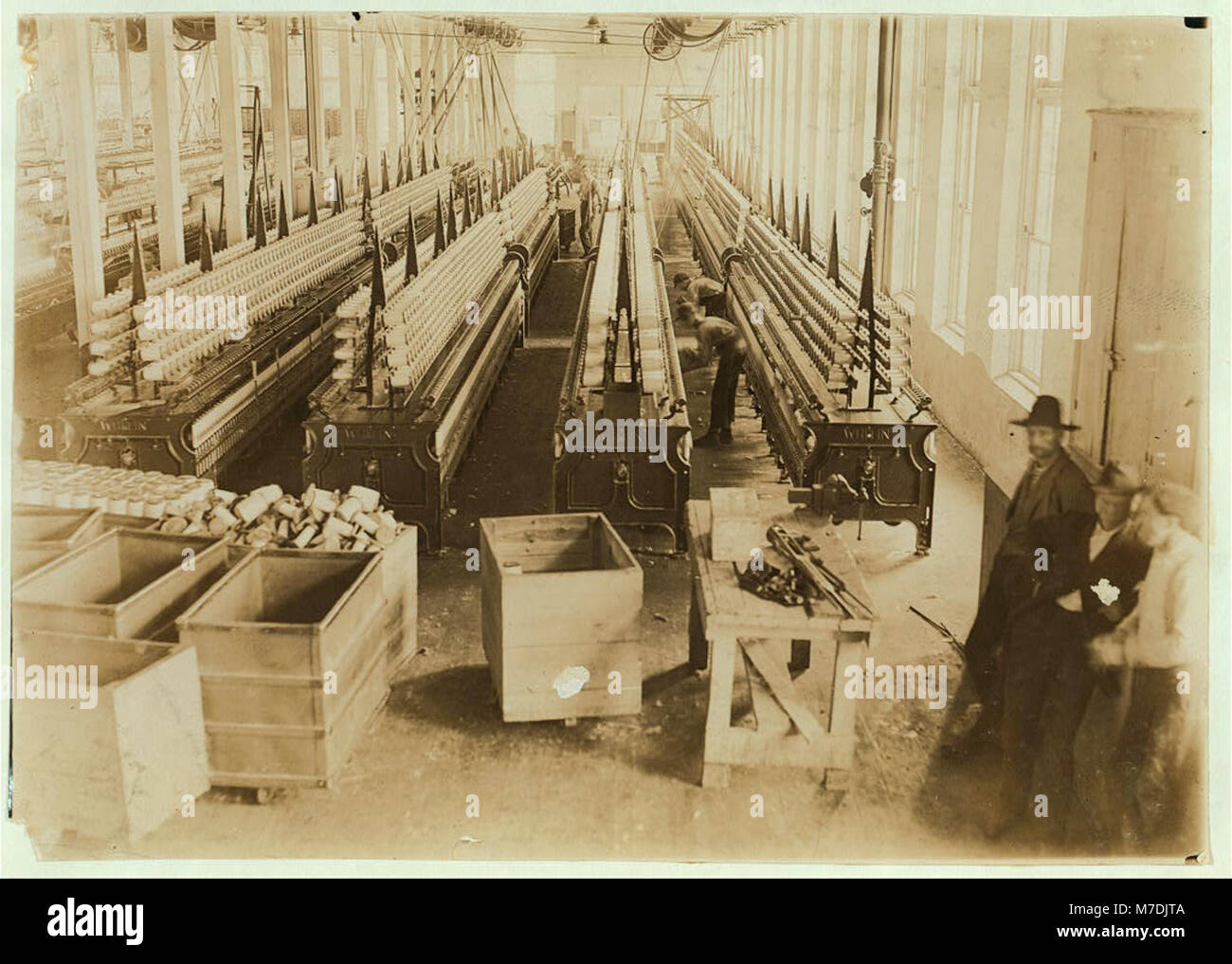 A photograph of the spinning room at Melville Manufacturing Company in ...