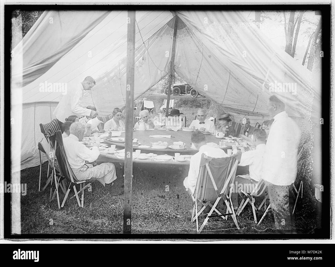 This photograph shows a military mess tent, used for feeding soldiers ...