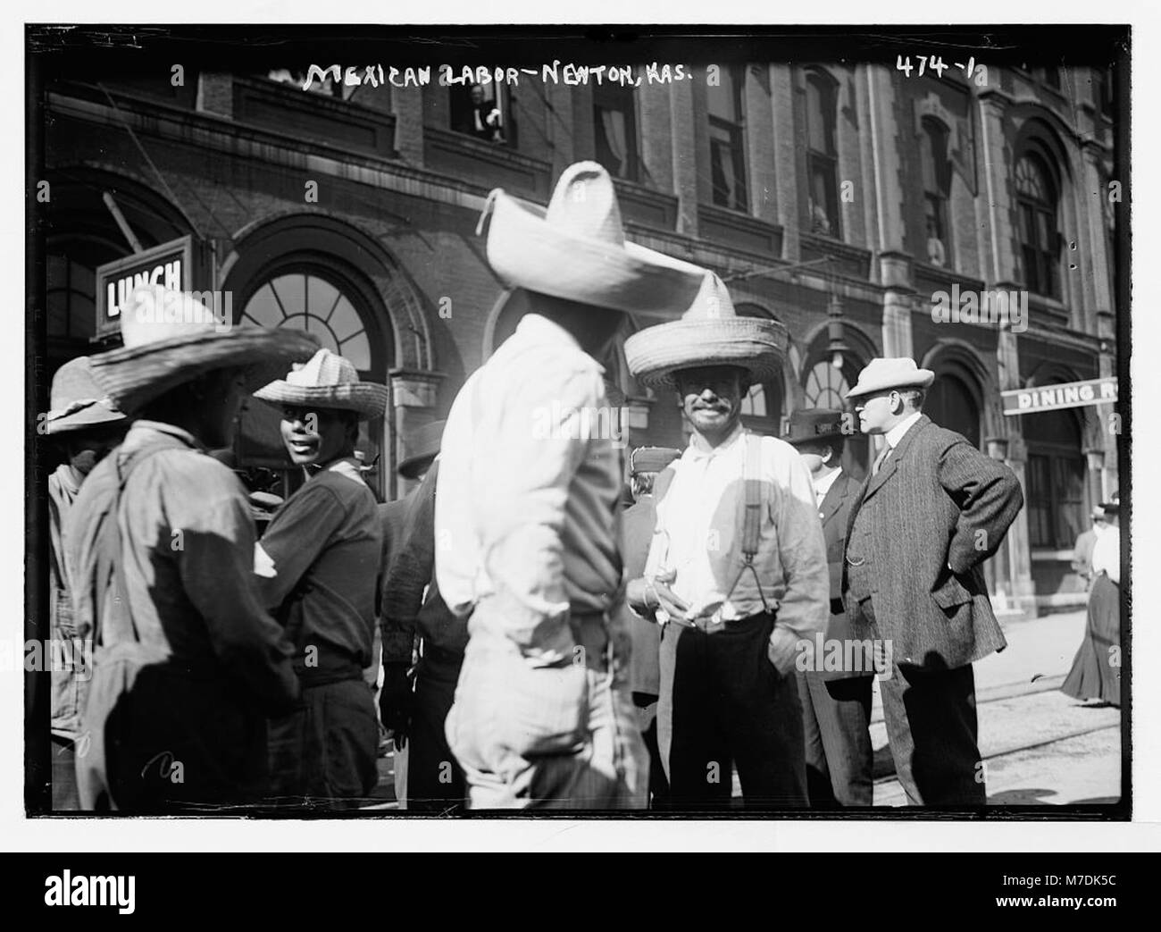 A historical photograph depicting Mexican laborers in Newton, Kansas ...
