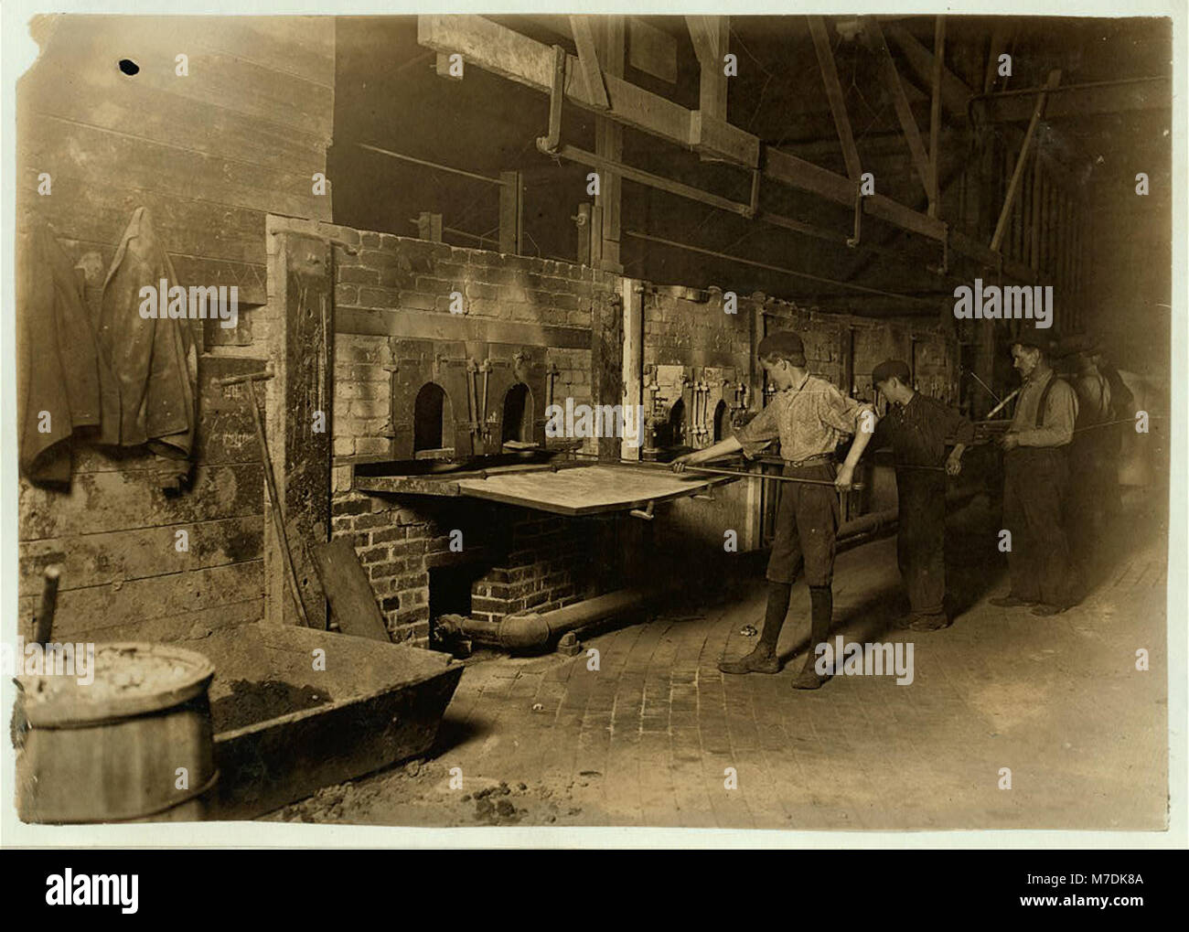 A late-night scene at a glass works factory in Grafton, West Virginia ...