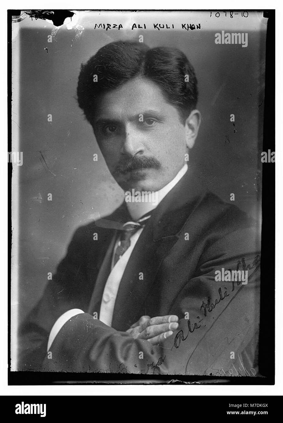 This is a portrait of Mirza Ali Kuli Khan, a historical figure likely ...