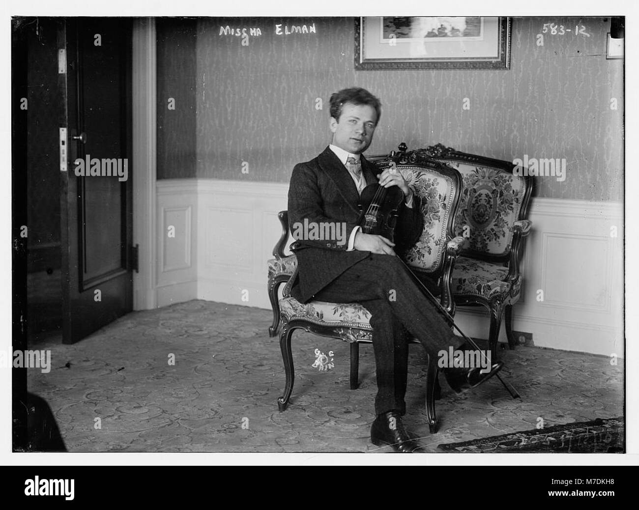 A portrait of Mischa Elman, a renowned violinist, captured in the early ...