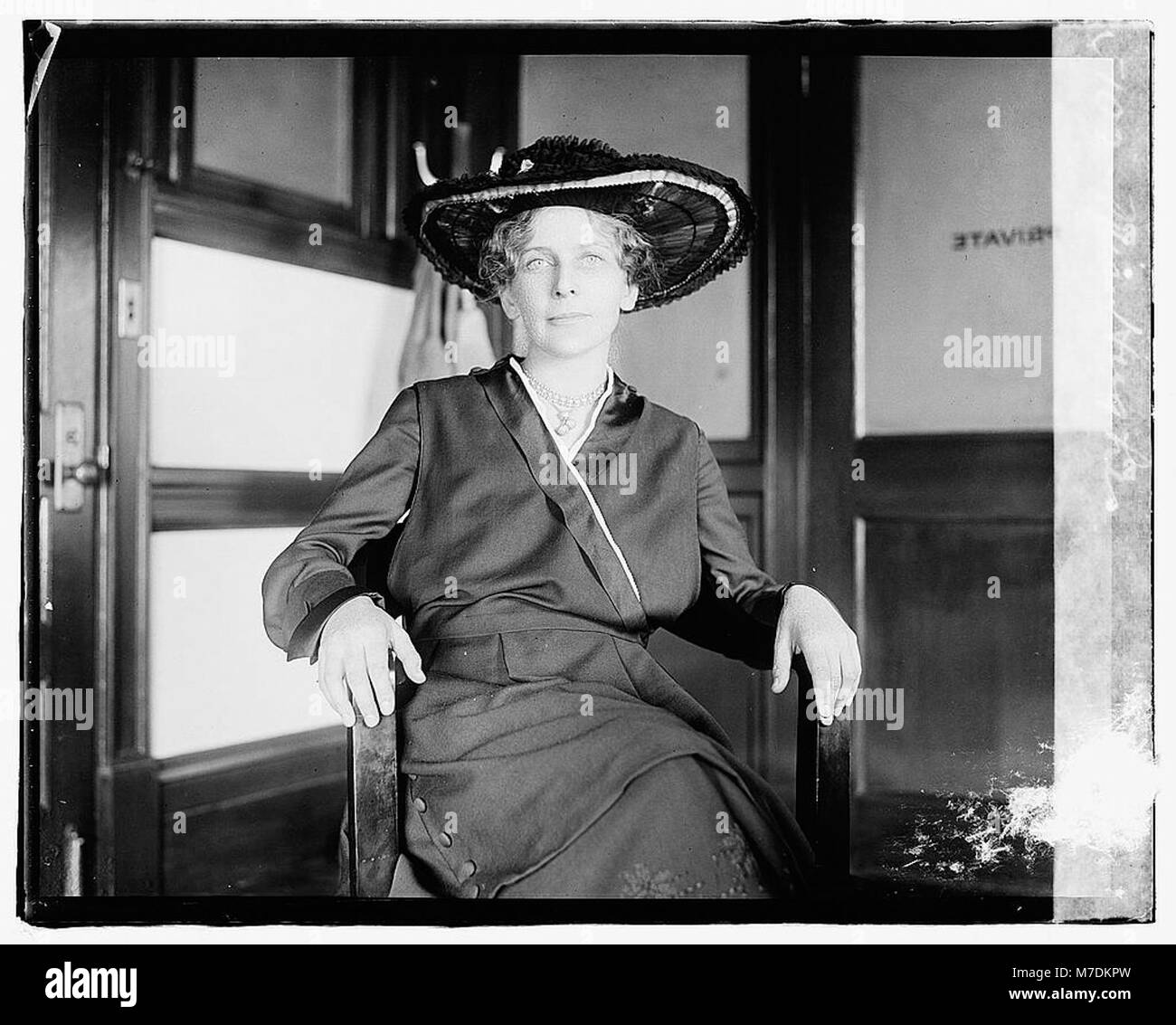 Miss Hughes is featured in a historical photograph, capturing a moment ...