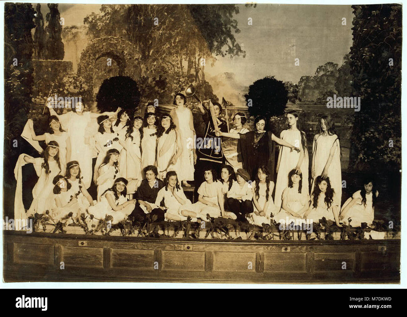 A photo capturing a pageant performance titled 'Children of Sunshine ...