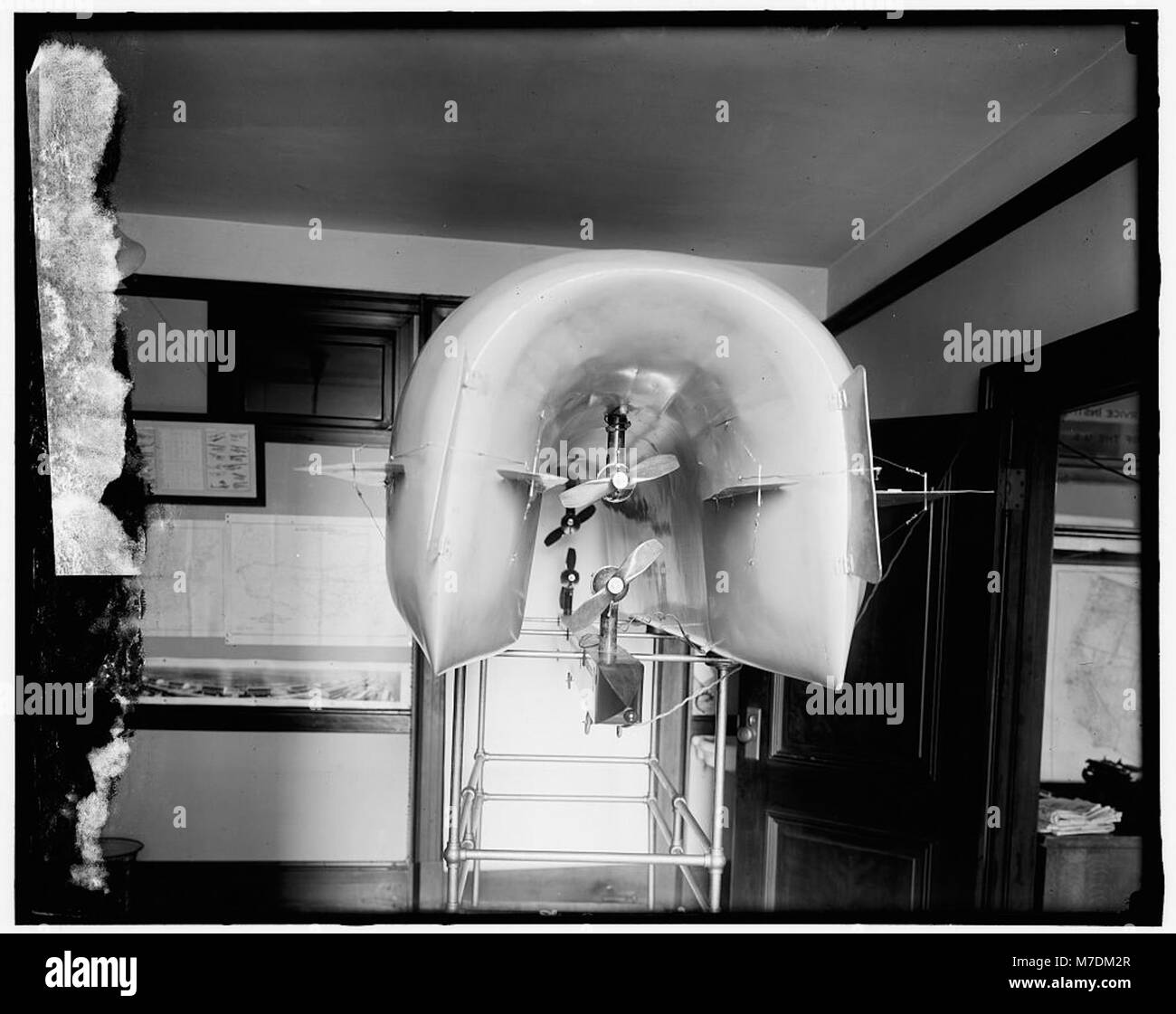 This photograph shows a model airplane, reflecting the early days of ...