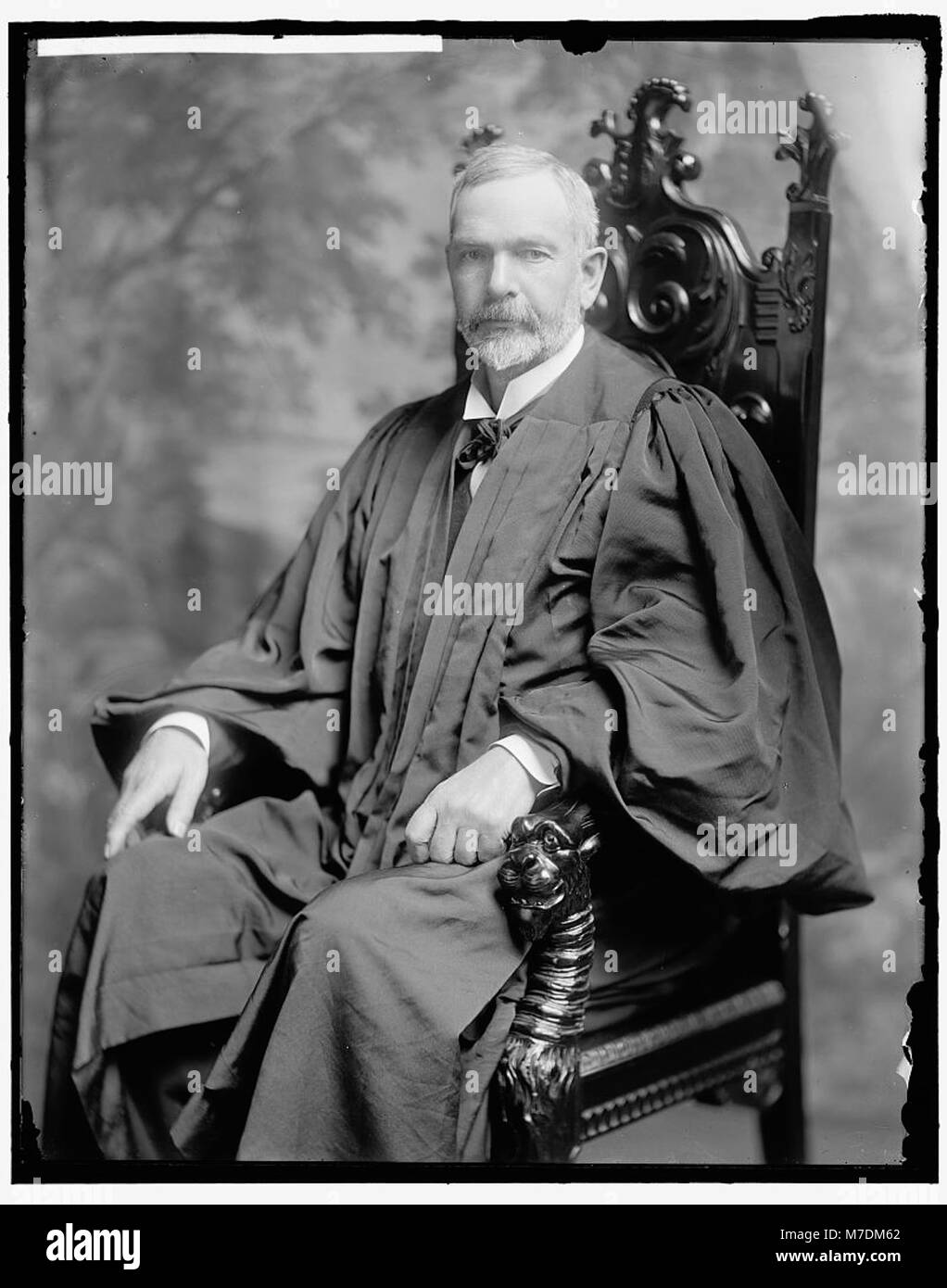 A portrait of R.M. Montgomery, a judge, captured in a formal style ...