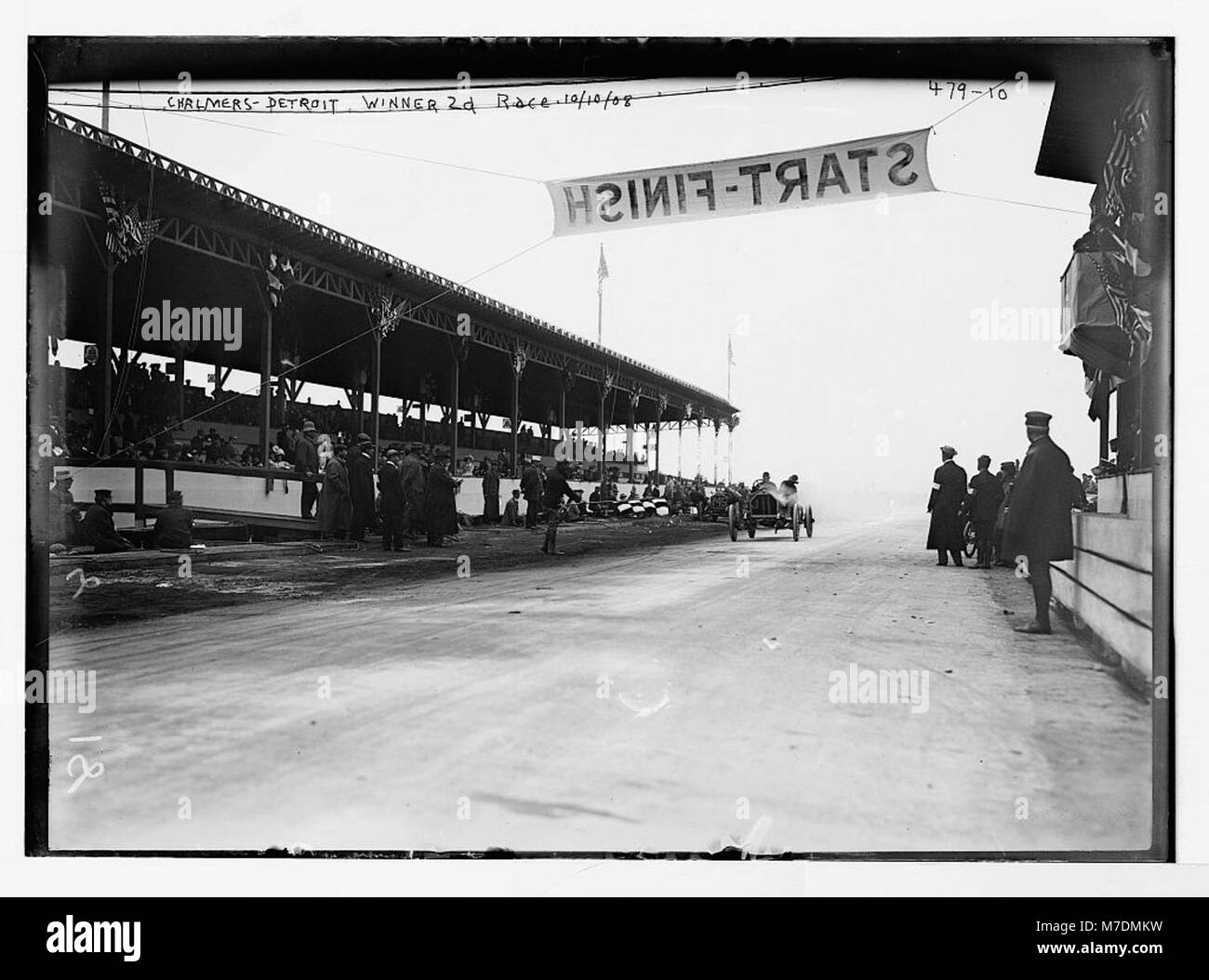 A photograph capturing the Chalmers car winning the second race in the ...