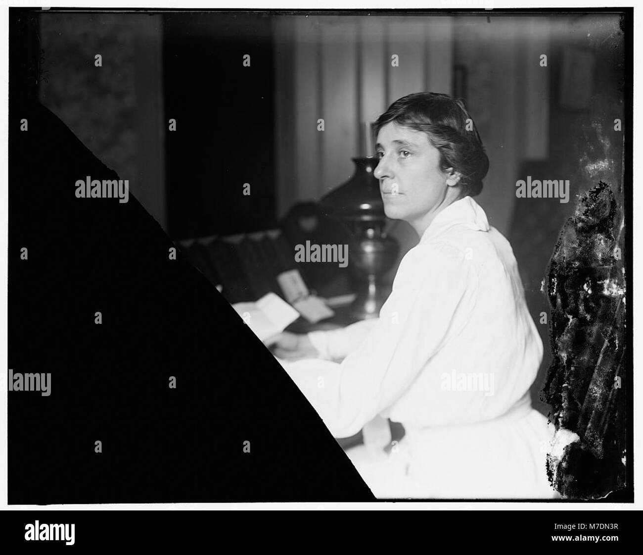 A formal portrait of Mrs. Abby Scott Baker, likely taken in the early ...