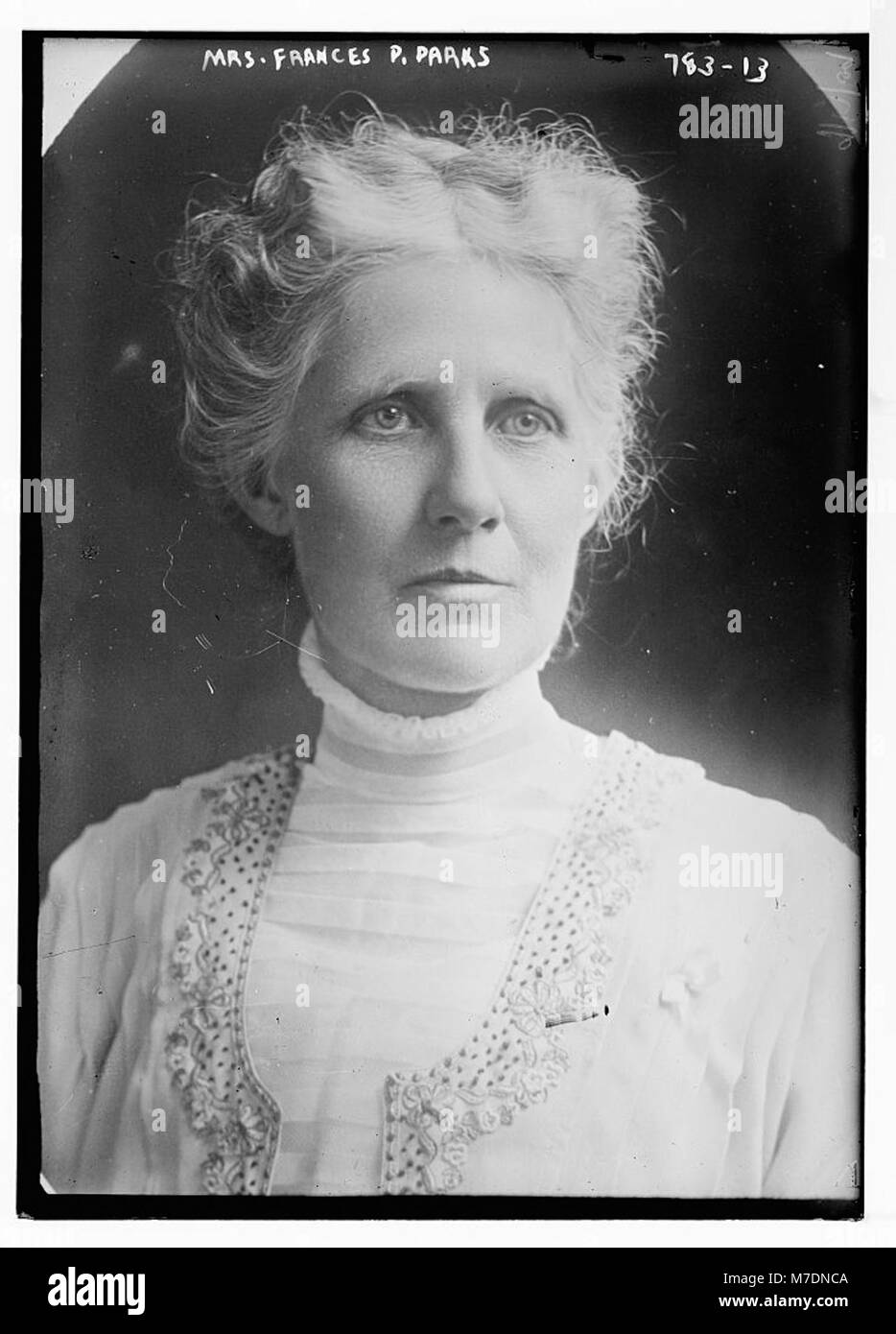 A portrait of Mrs. Frances P. Parks, capturing her likeness in a moment ...