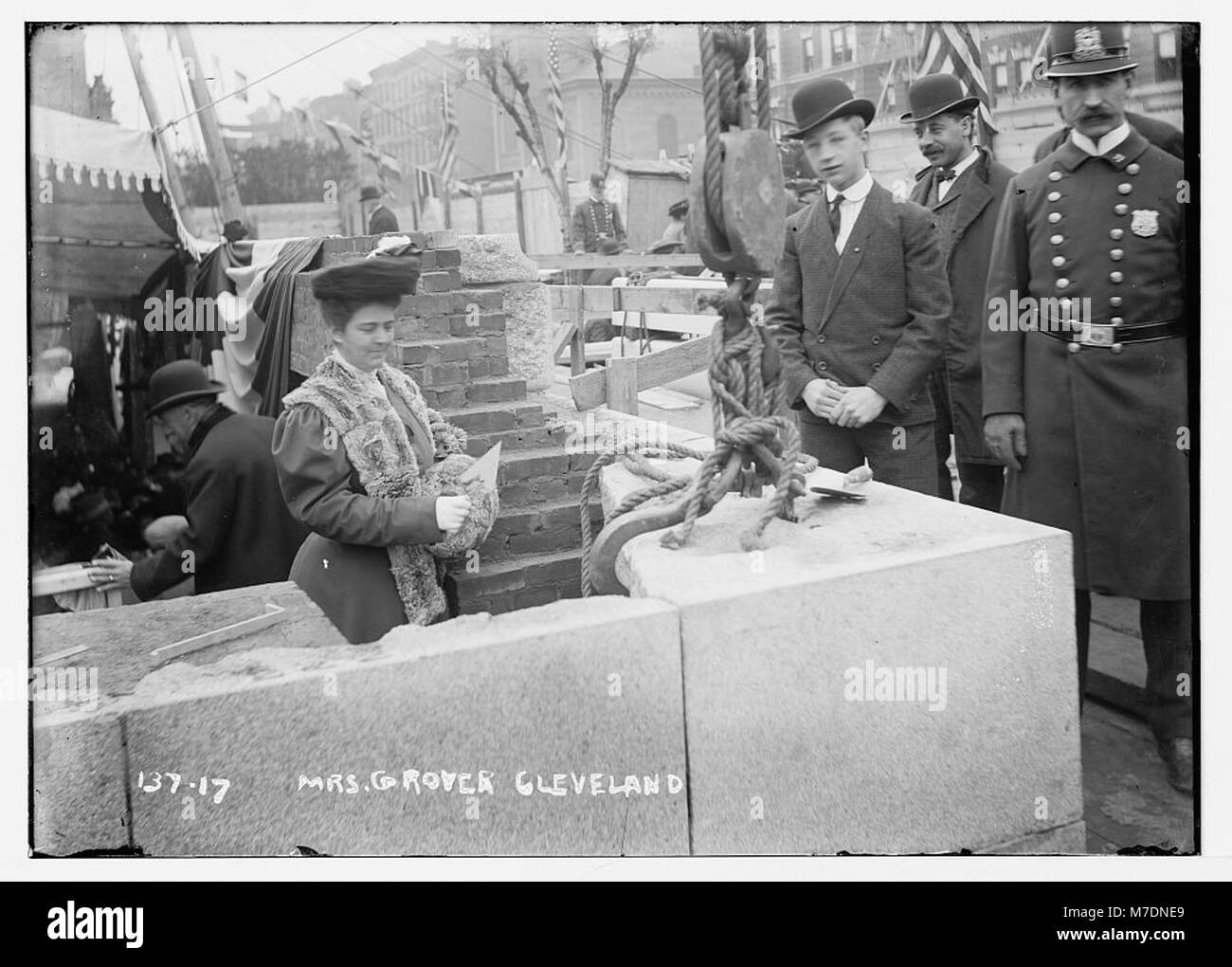 This photograph features Mrs. Grover Cleveland, a policeman, and other ...