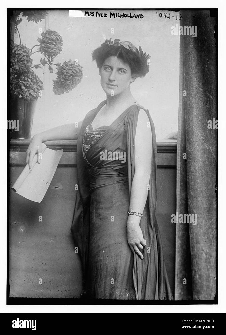 Mrs. Inez Milholland posing with scroll of paper; Mrs. Inez Milholland ...