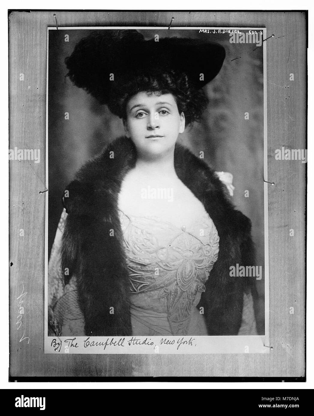 A formal portrait of Mrs. J.R. Drexel, capturing her dignified presence ...